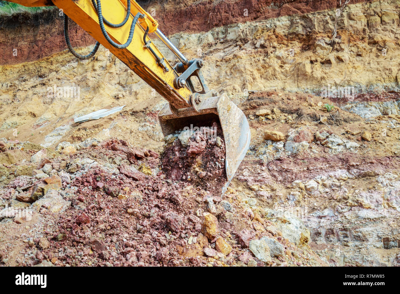 Excavator work on the construction site. Bucket closeup Stock Photo - Alamy