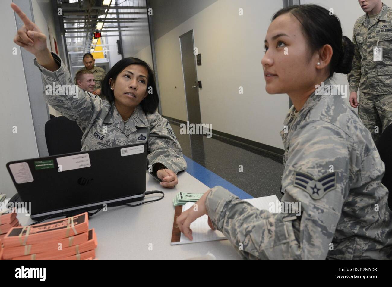 Master Sgt. Mary Anne Reyes, flight chief of financial analysis from ...