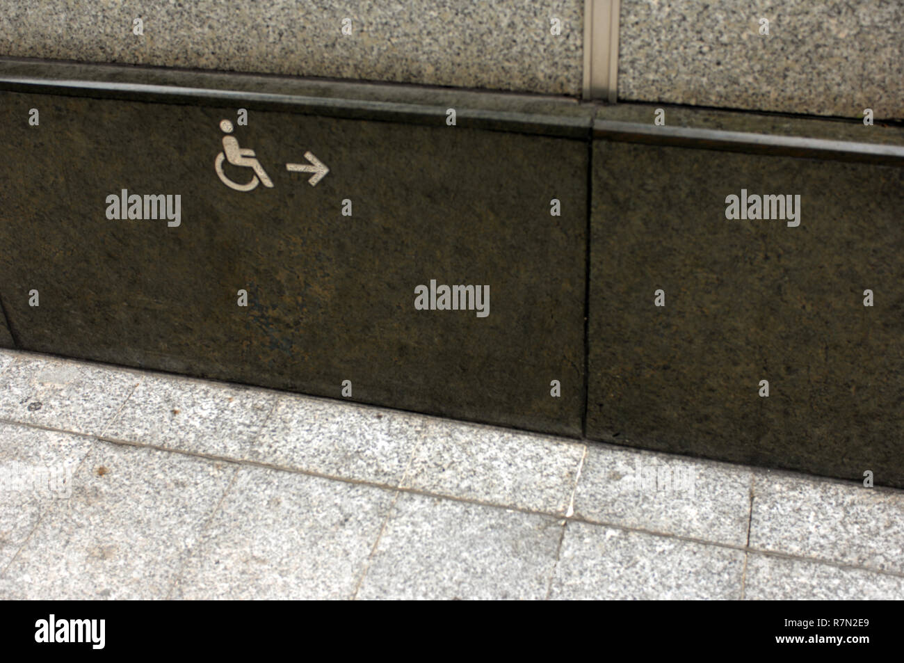 Wheel chair sign painted hi-res stock photography and images - Alamy
