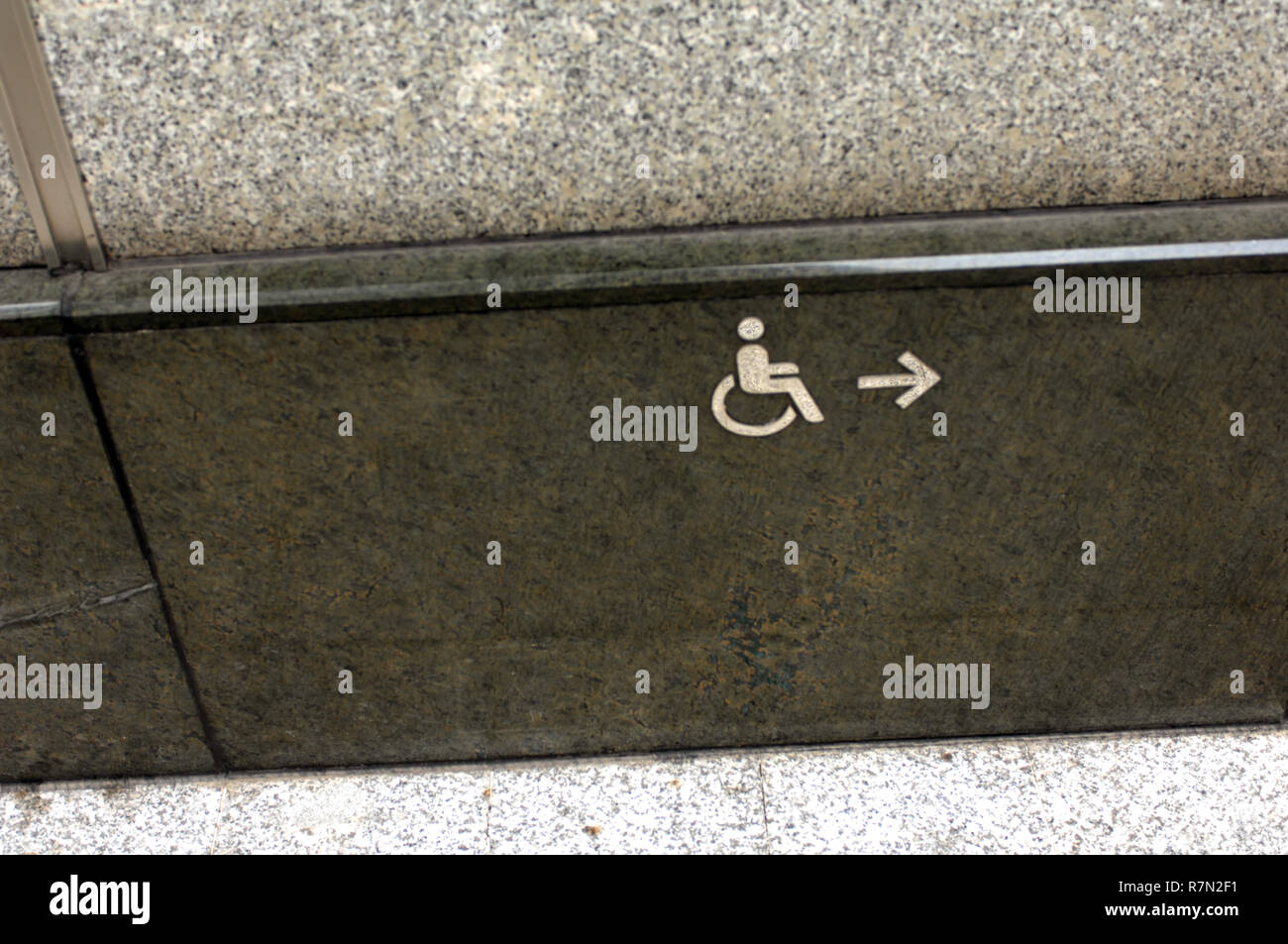 Wheel chair sign painted on wall, Hong Kong, China Stock Photo - Alamy