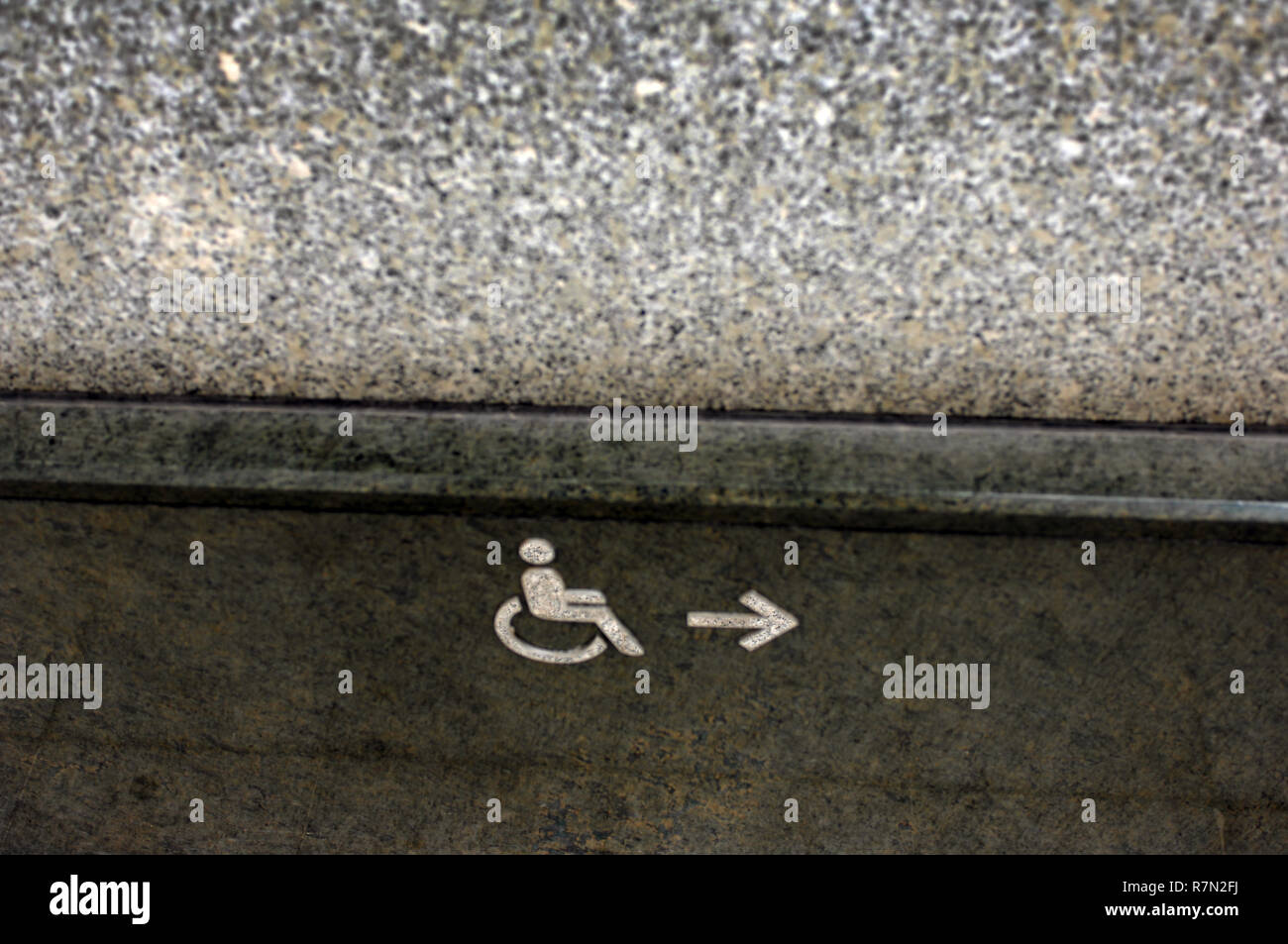 Wheel chair sign painted on wall, Hong Kong, China Stock Photo - Alamy