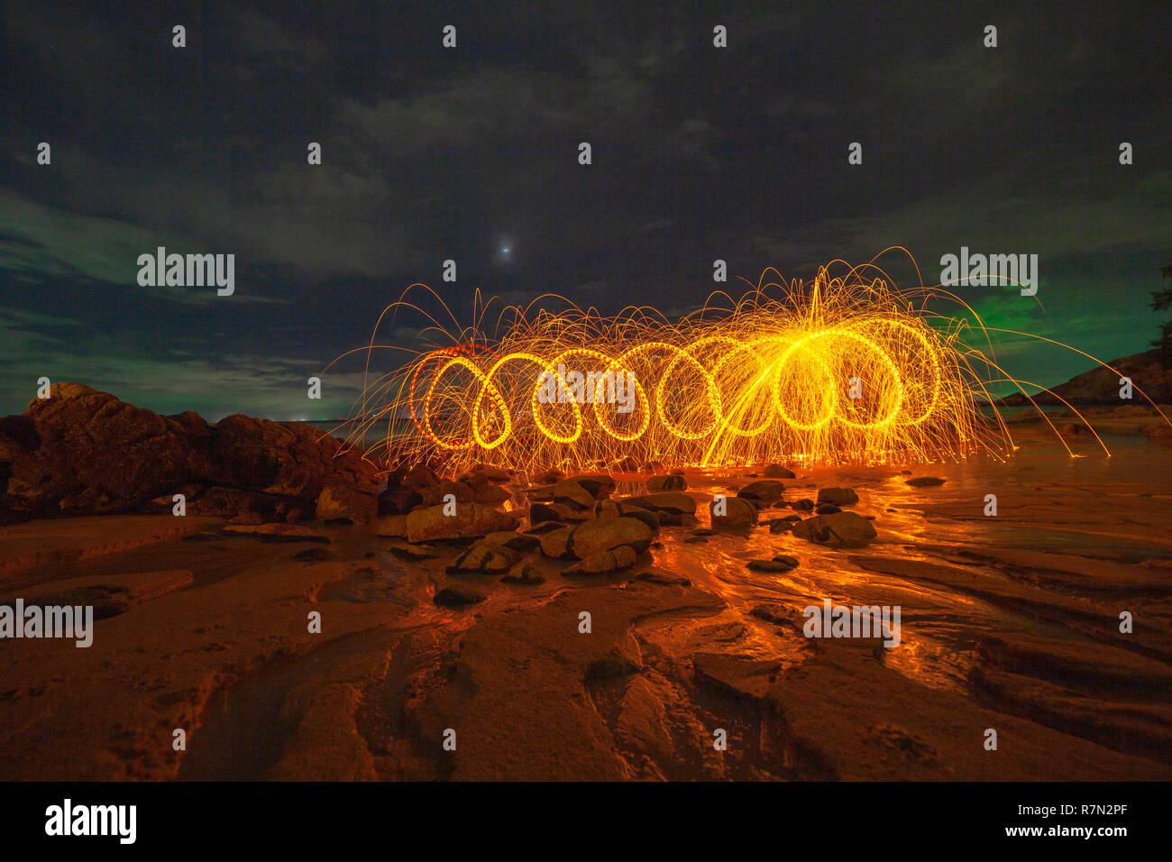 cool burning steel wool art fire work photo experiments on the beach at ...