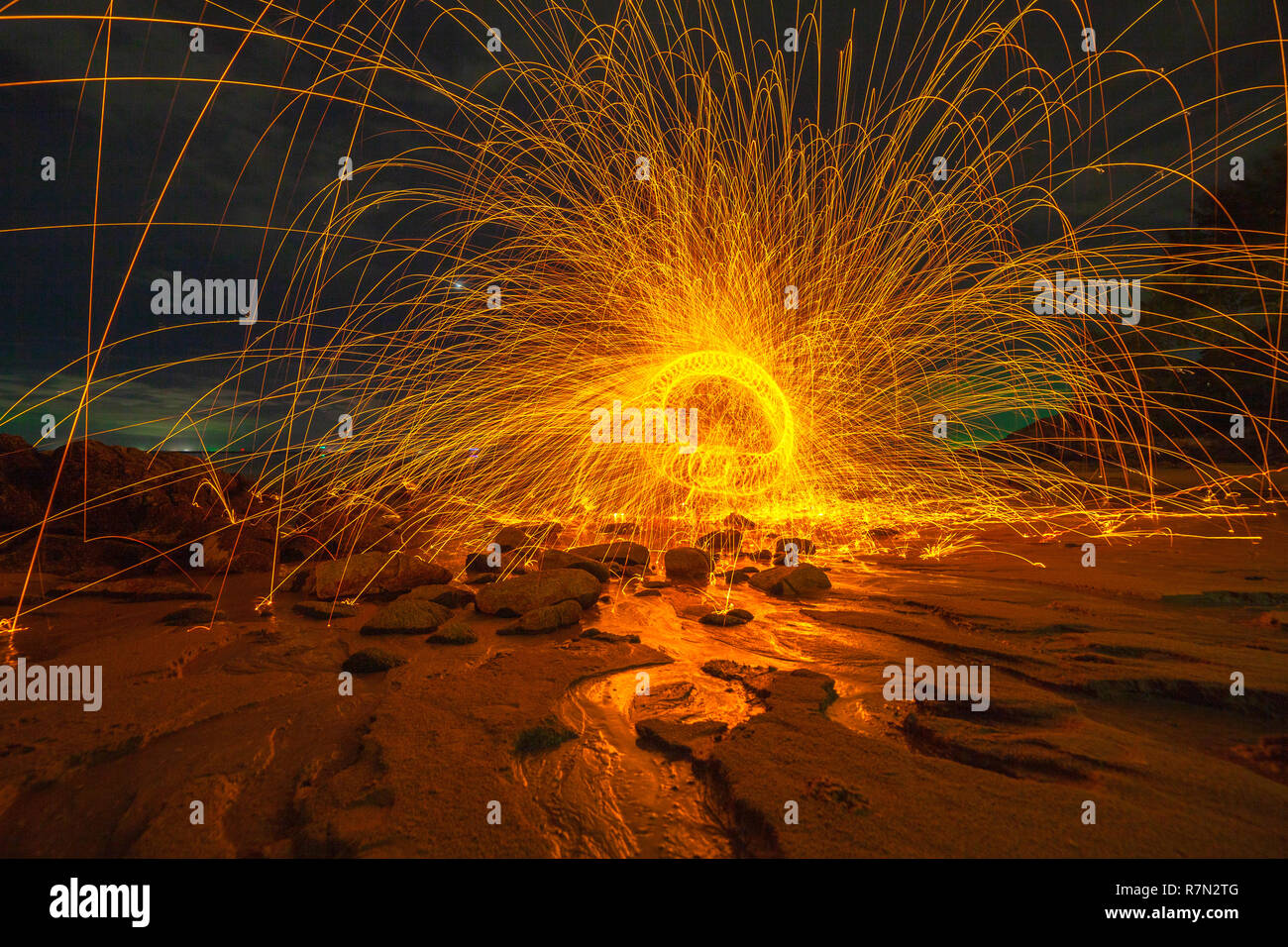 cool burning steel wool art fire work photo experiments on the beach at ...