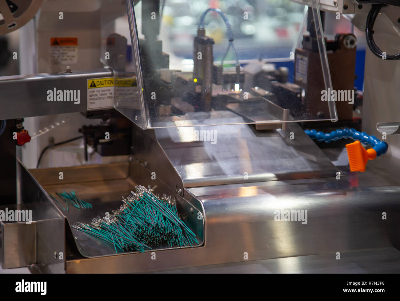 Automatic Wire Cut, Strip and Crimp Machine Stock Photo - Alamy