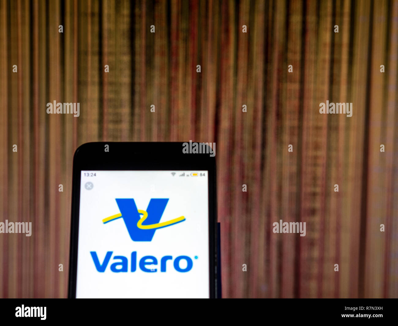 Valero Energy Company logo seen displayed on smart phone Stock Photo ...