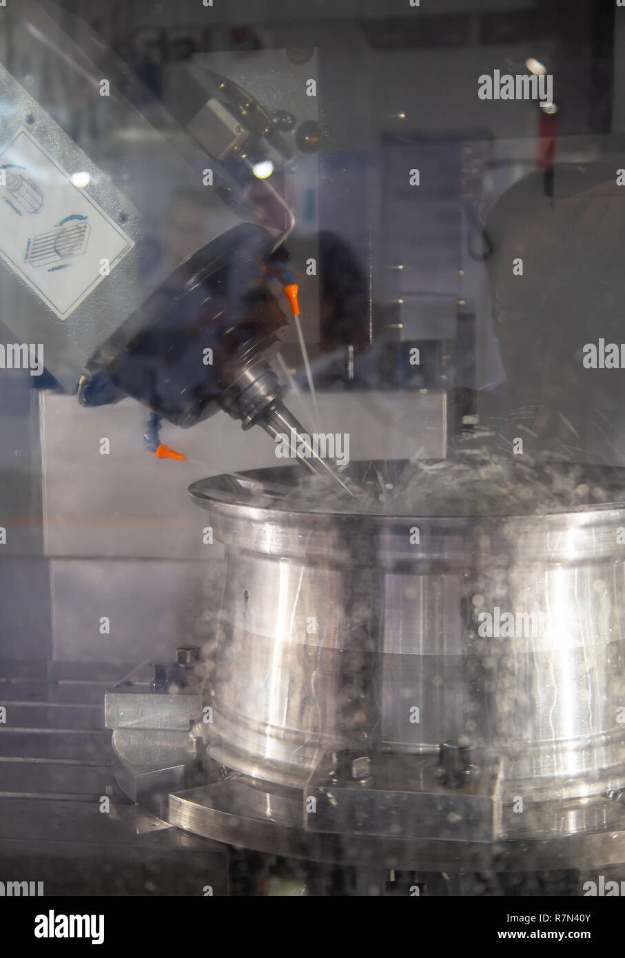 Car alloy wheel machining on CNC milling machine Stock Photo - Alamy