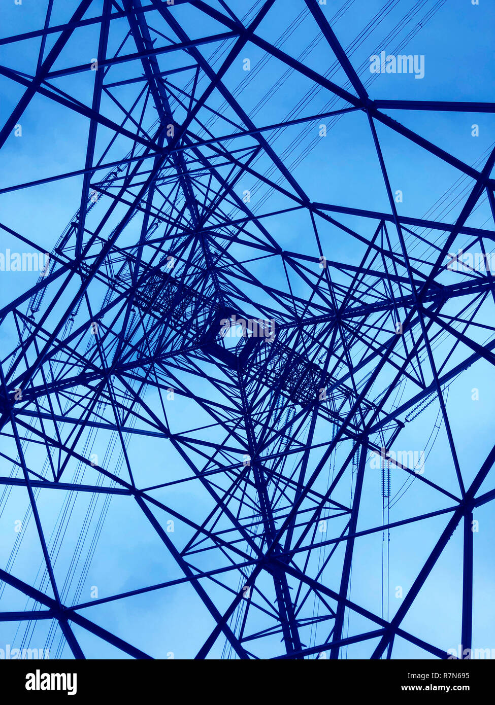 Power line tower viewed from above. Geometrical structure. Energy ...