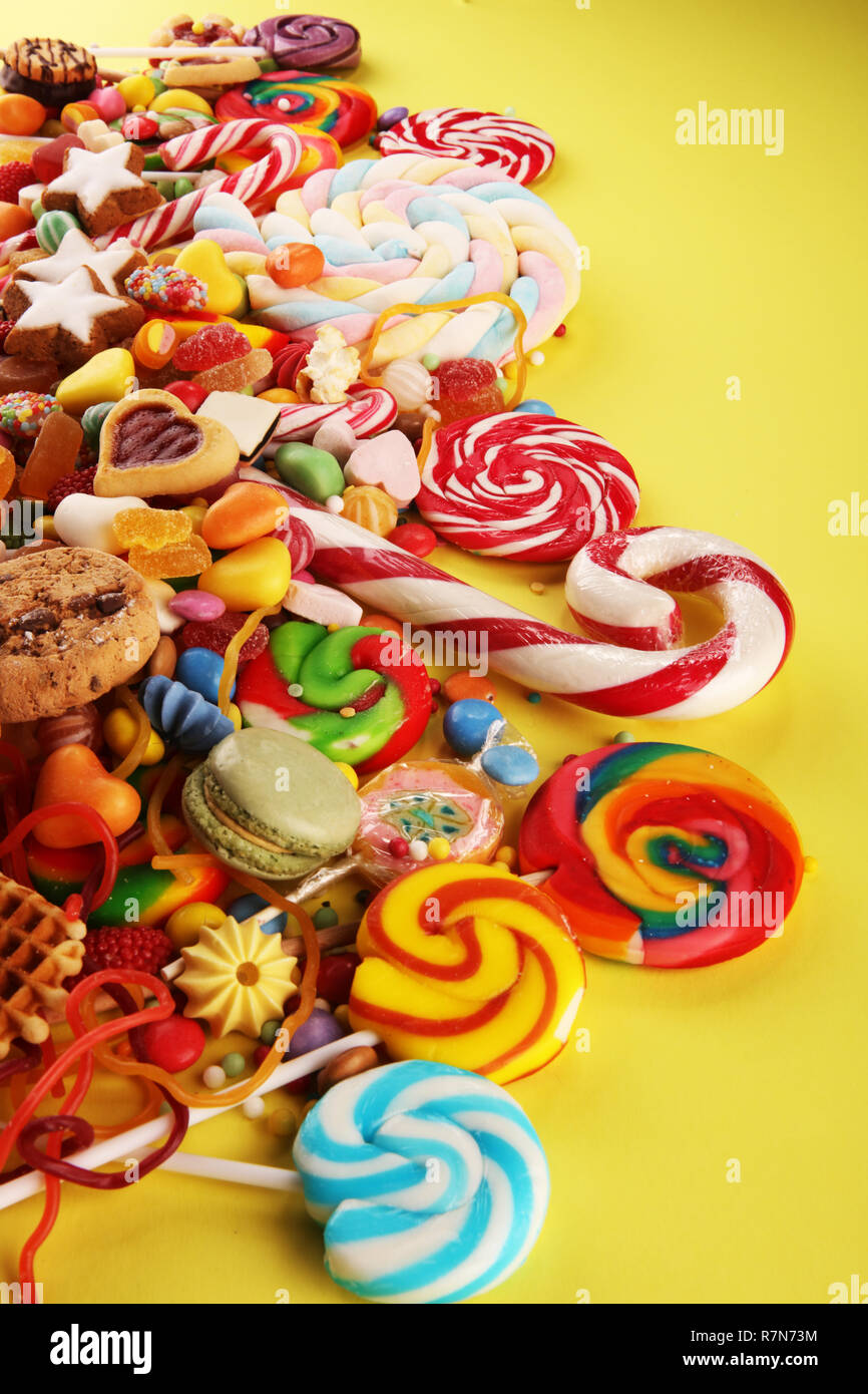 candies with jelly and sugar. colorful array of different childs sweets ...