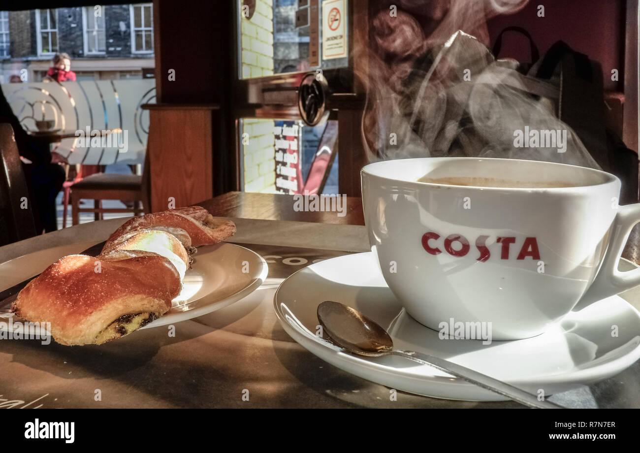 Breakfast at a coffee shop, coffee and croissants Stock Photo - Alamy