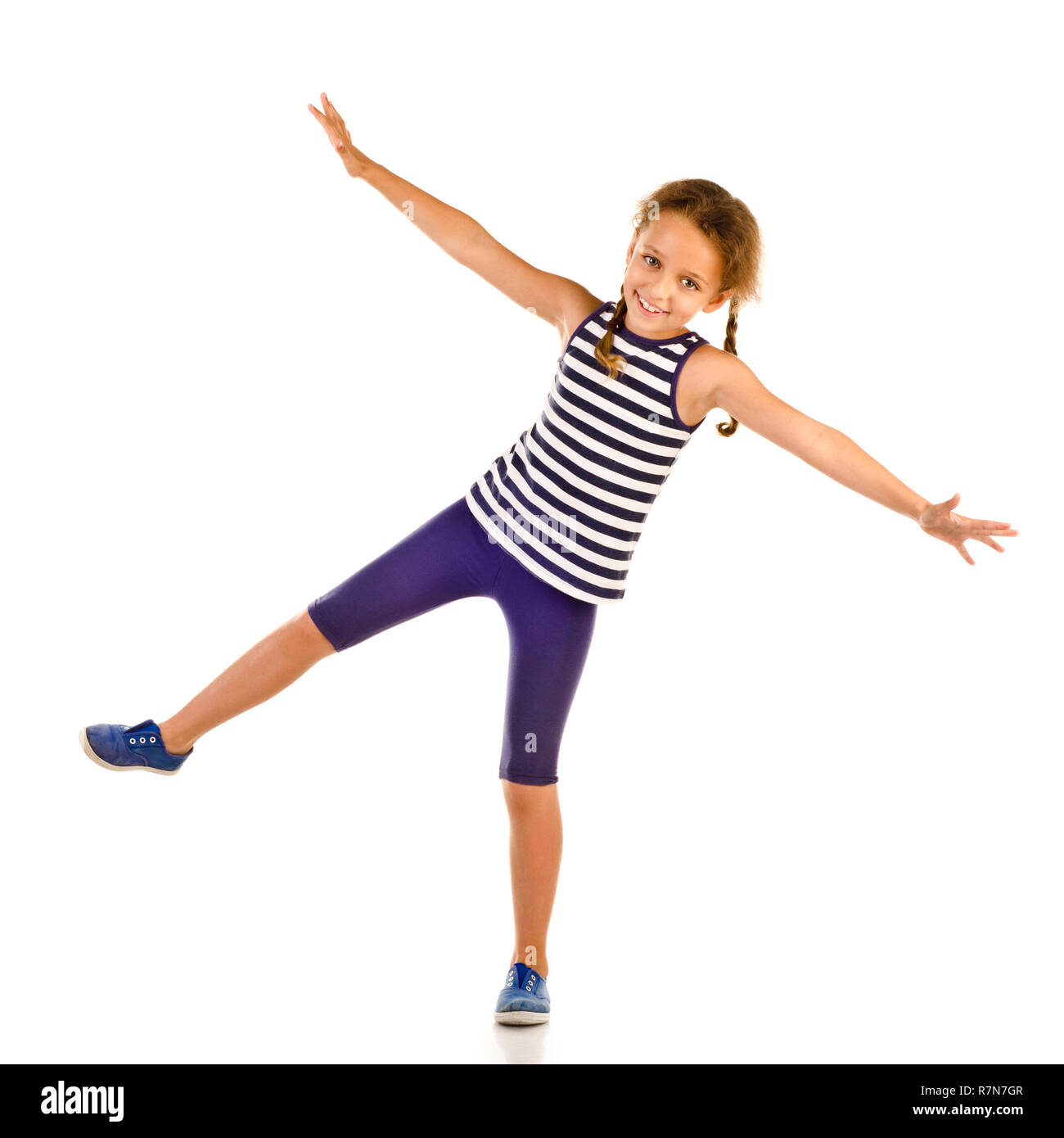 jumping little girl isolated on a white background Stock Photo - Alamy