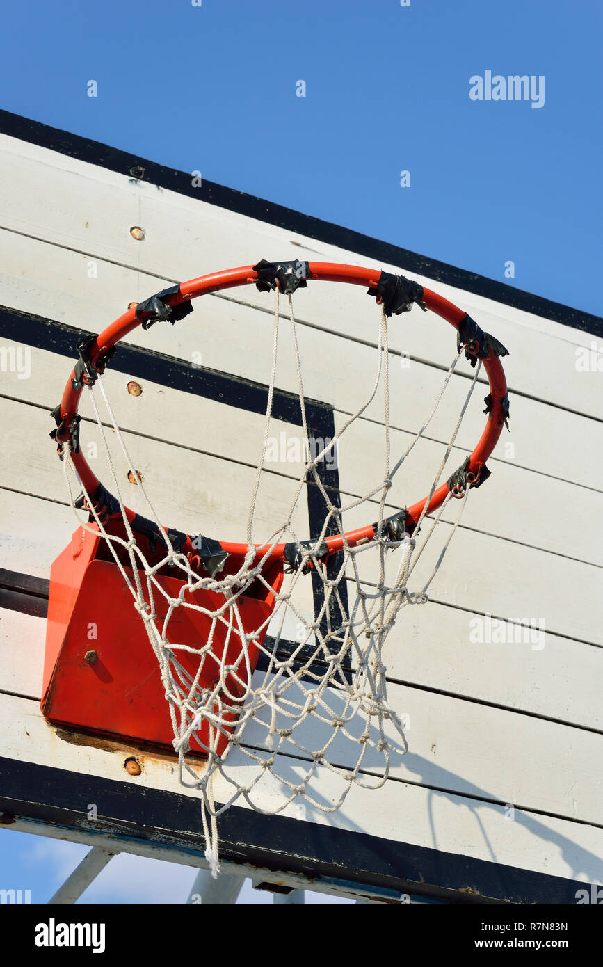 Basketball hoop with blue sky background Stock Photo - Alamy