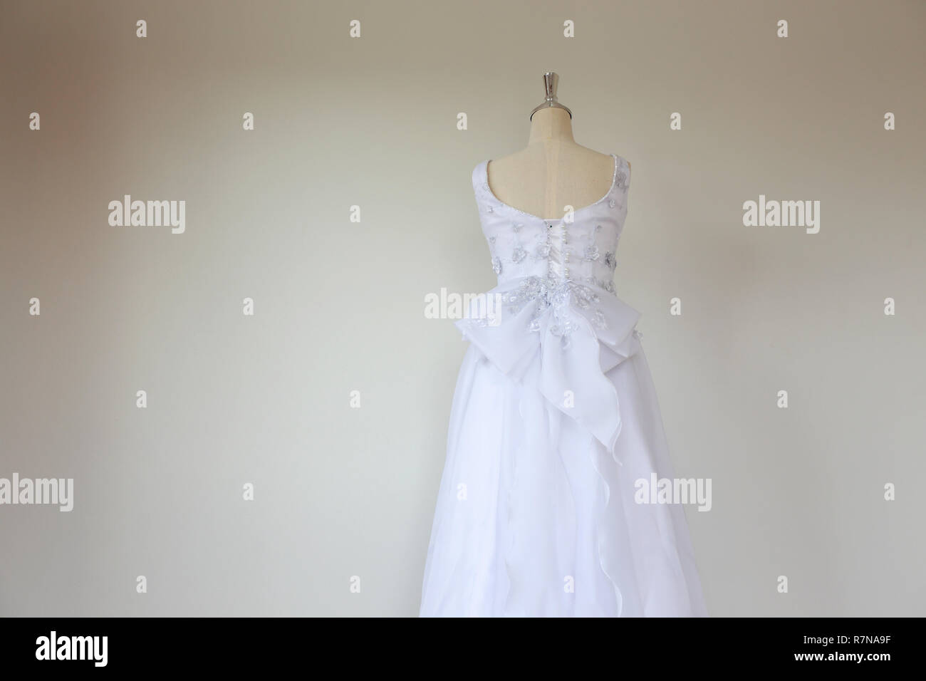 Wedding dress on white background Stock Photo - Alamy