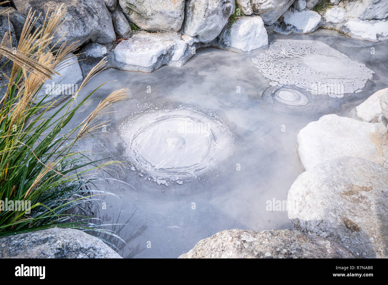 Oniishibozu Jigoku (Ghost Rock Monk Hell) pond in autumn, which is one ...