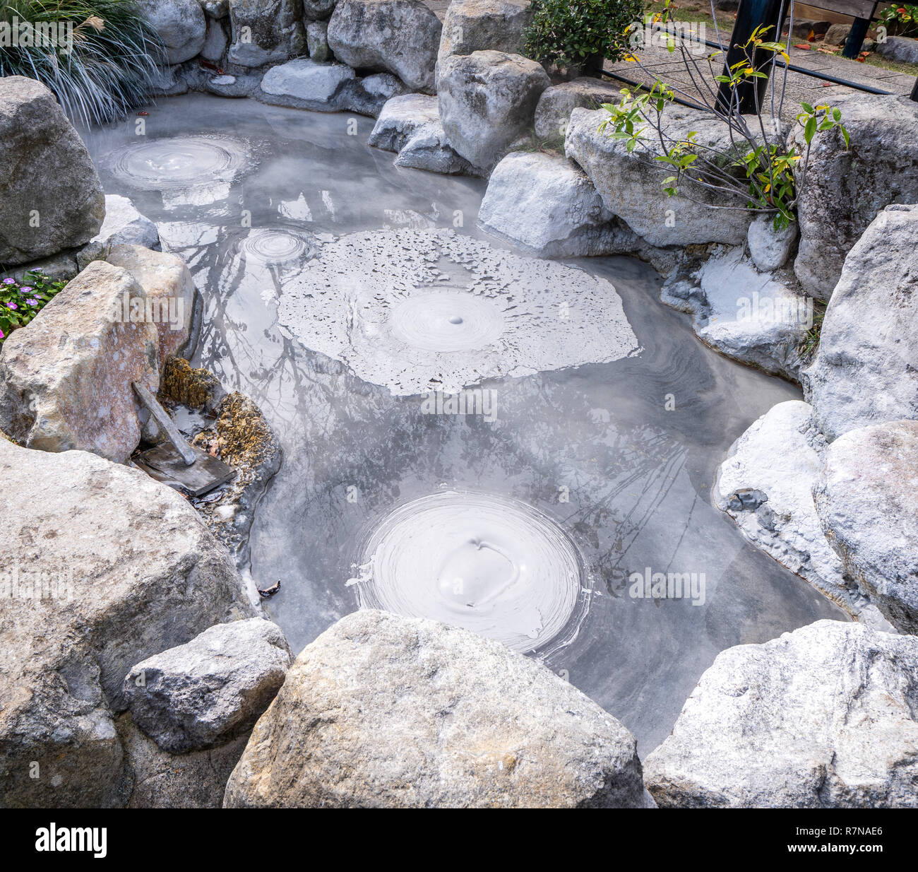 Oniishibozu Jigoku (Ghost Rock Monk Hell) pond in autumn, which is one ...