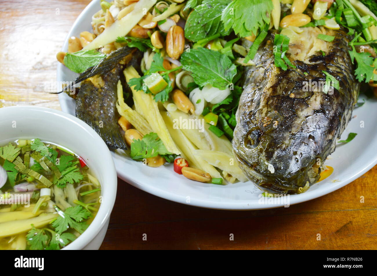 Chinese fish head soup hi-res stock photography and images - Alamy