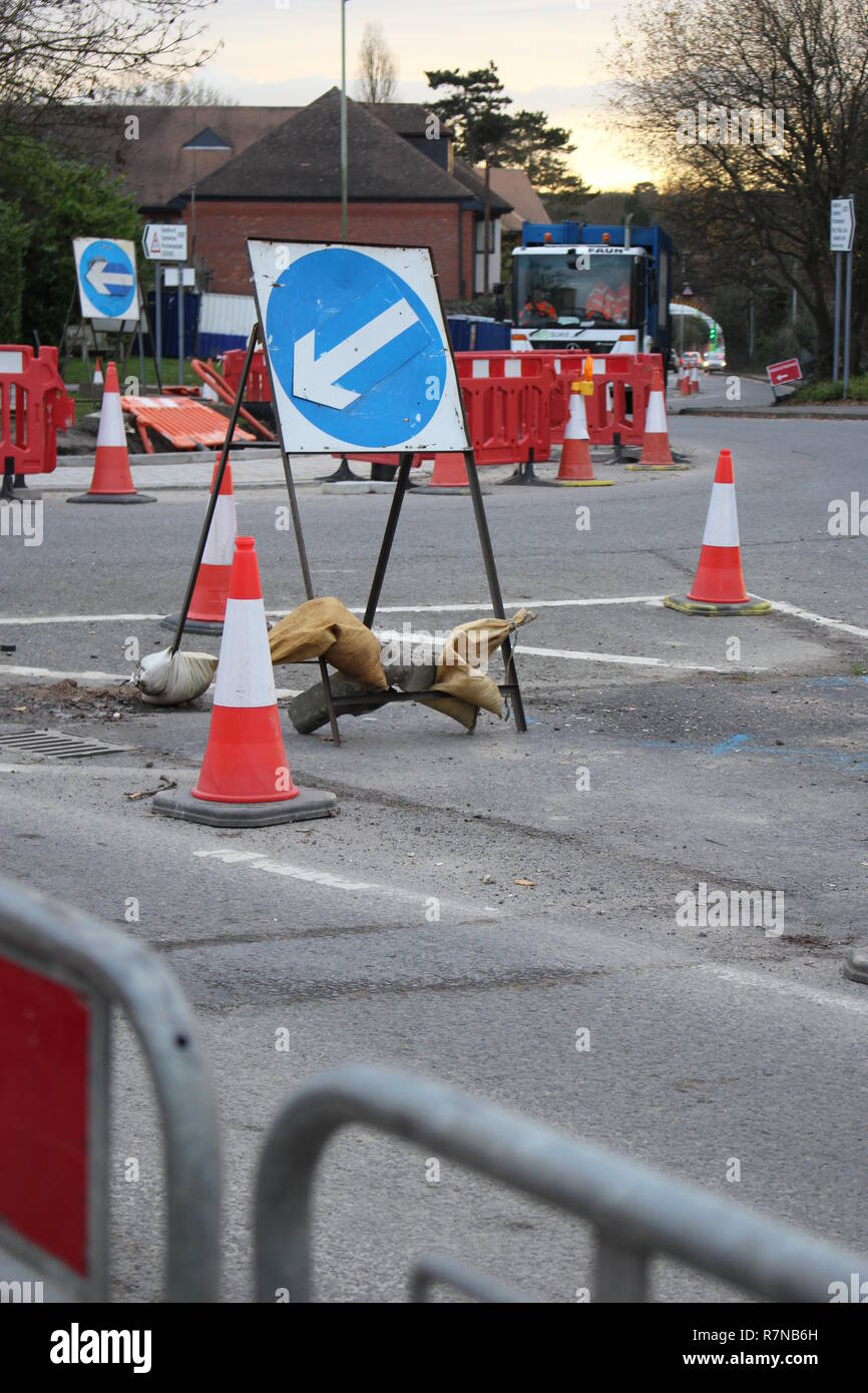 Pedestrian Dented Metal Roadwork Sign and Traffic Cone Stock Photo - Alamy
