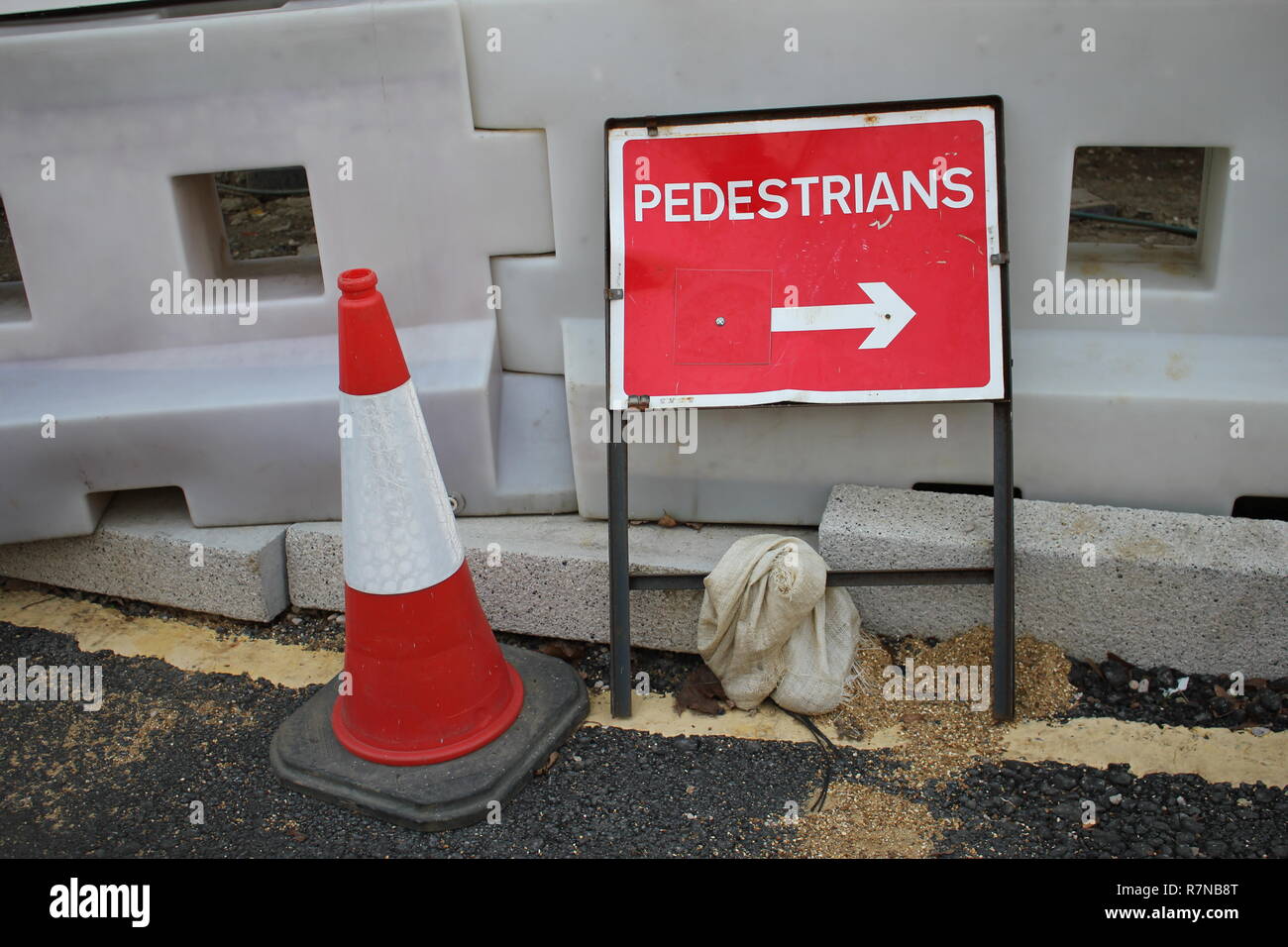 Pedestrian Dented Metal Roadwork Sign and Traffic Cone Stock Photo - Alamy