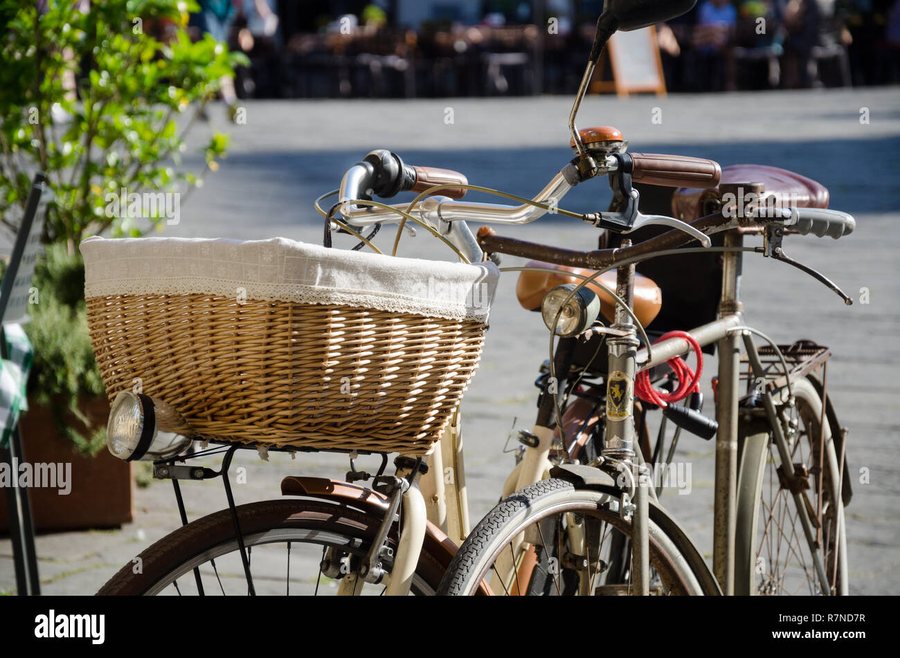 two vintage bicylces standing in a sunny city Stock Photo - Alamy