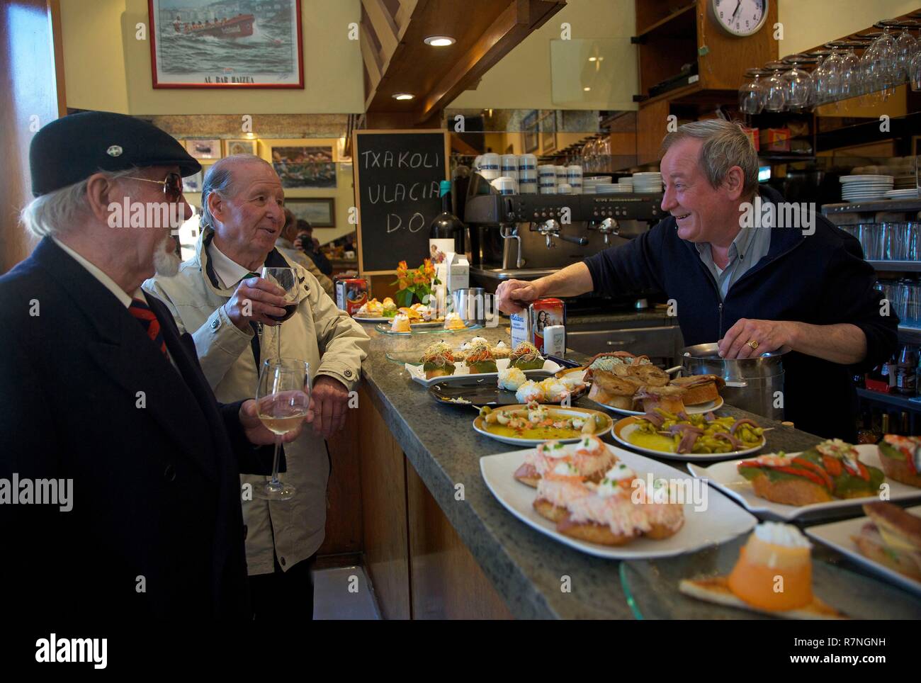 Spain, Basque country, San Sebastian, Owner of the Haizea bar with old ...