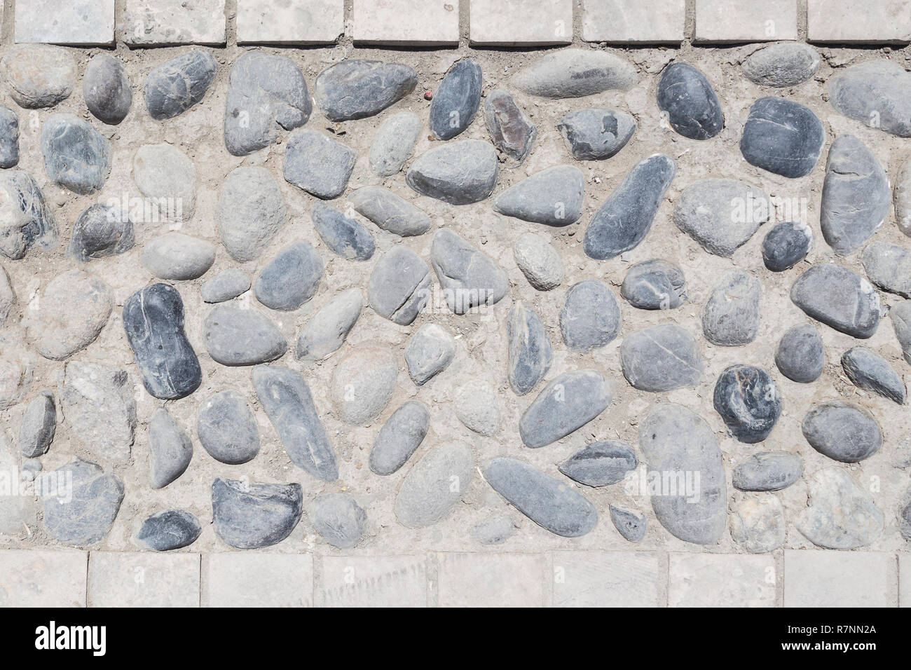 background and texture of granite stone wall surface. Close up of a ...