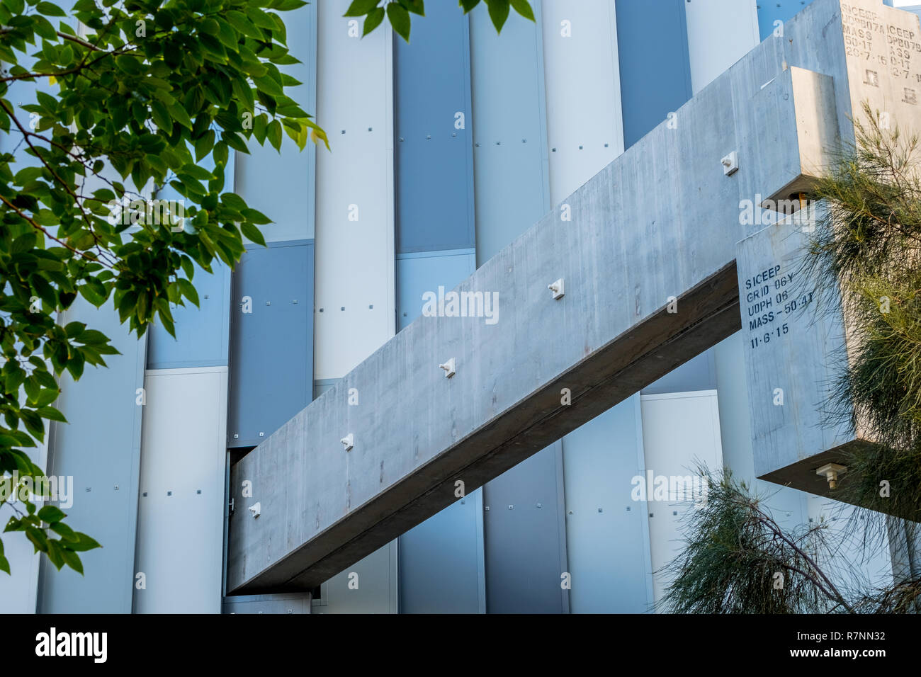 Concrete and blue building panels Stock Photo - Alamy