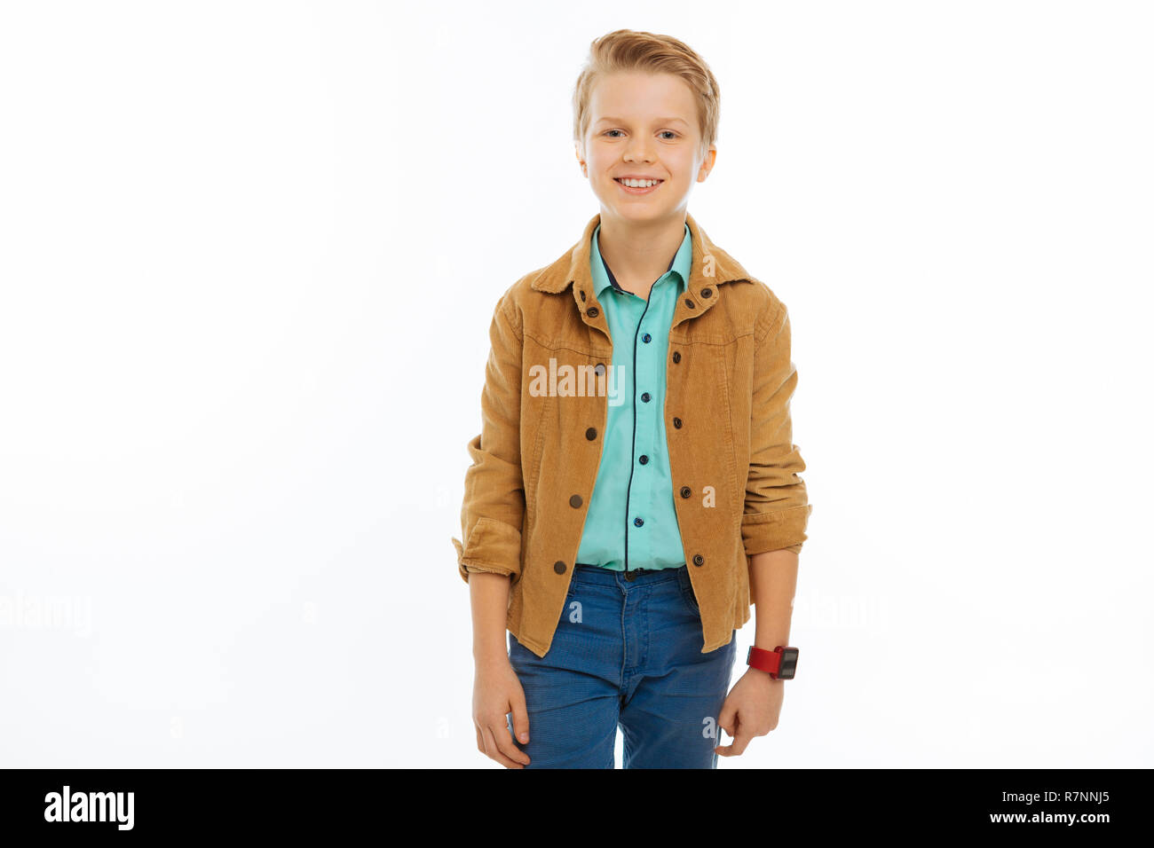 Cute cheerful nice boy smiling to you Stock Photo - Alamy
