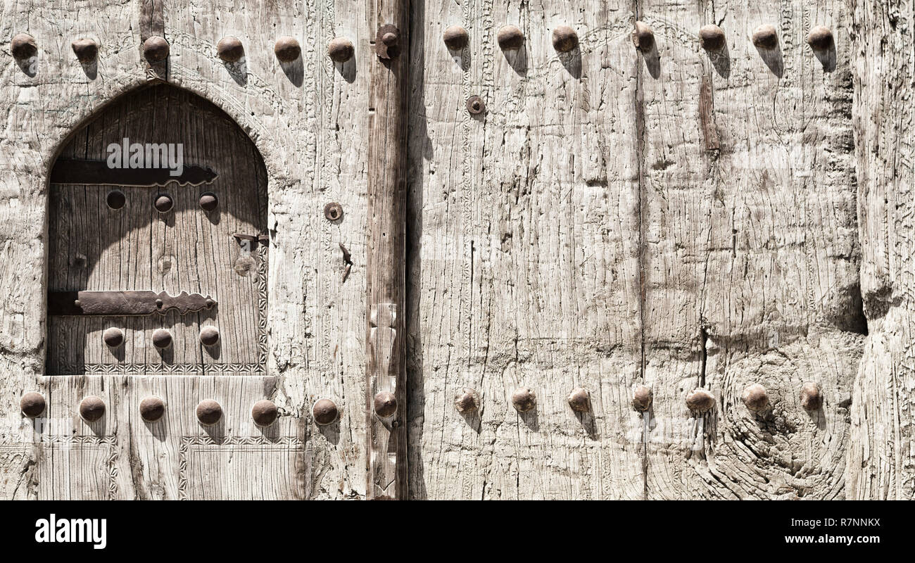 An old rustic wooden door. Middle Eastern islamic old door. East easia ...