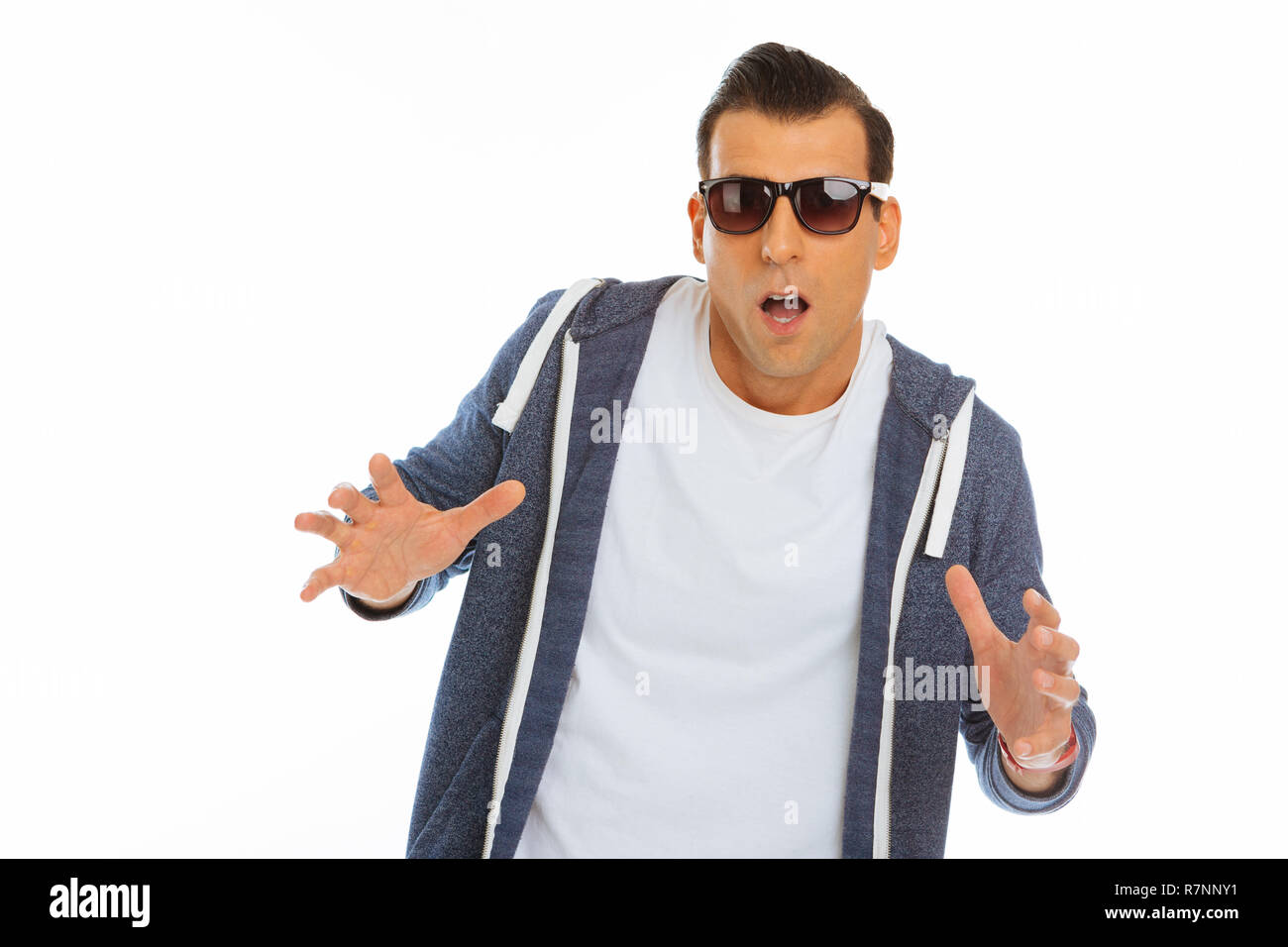 Portrait of a nice surprised young man Stock Photo - Alamy