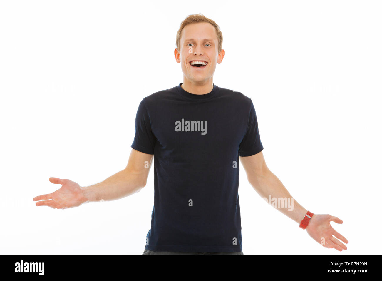 Happy cheerful young man feeling very positive Stock Photo - Alamy
