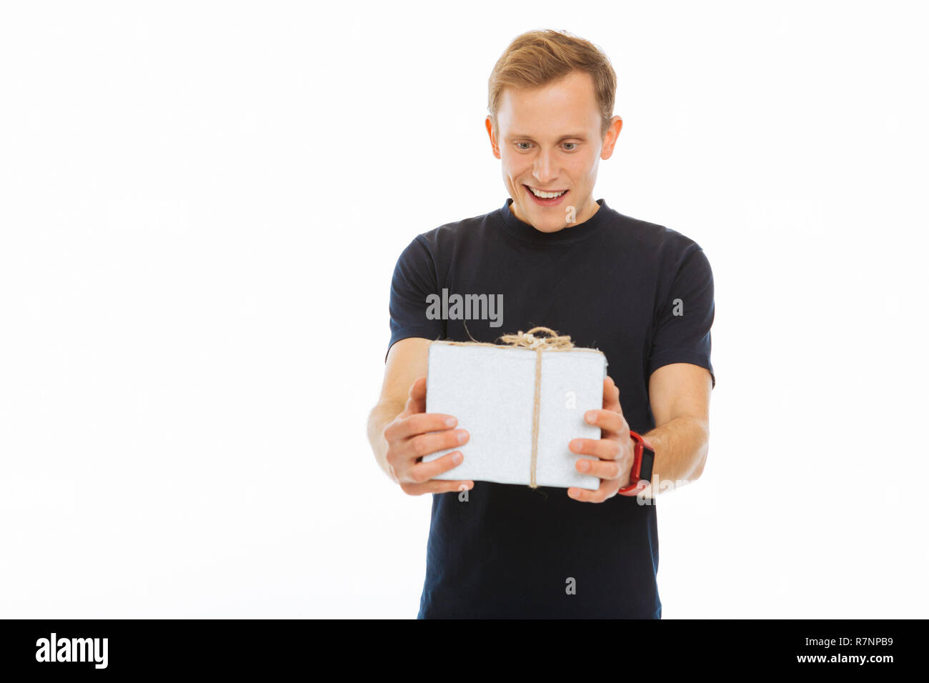 Smiling man delighted expression hi-res stock photography and images ...