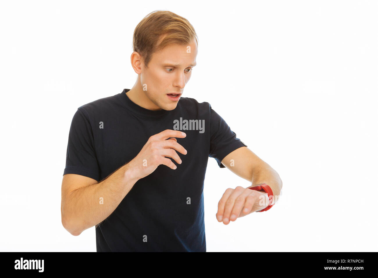 Pleasant emotional man being late for an appointment Stock Photo - Alamy