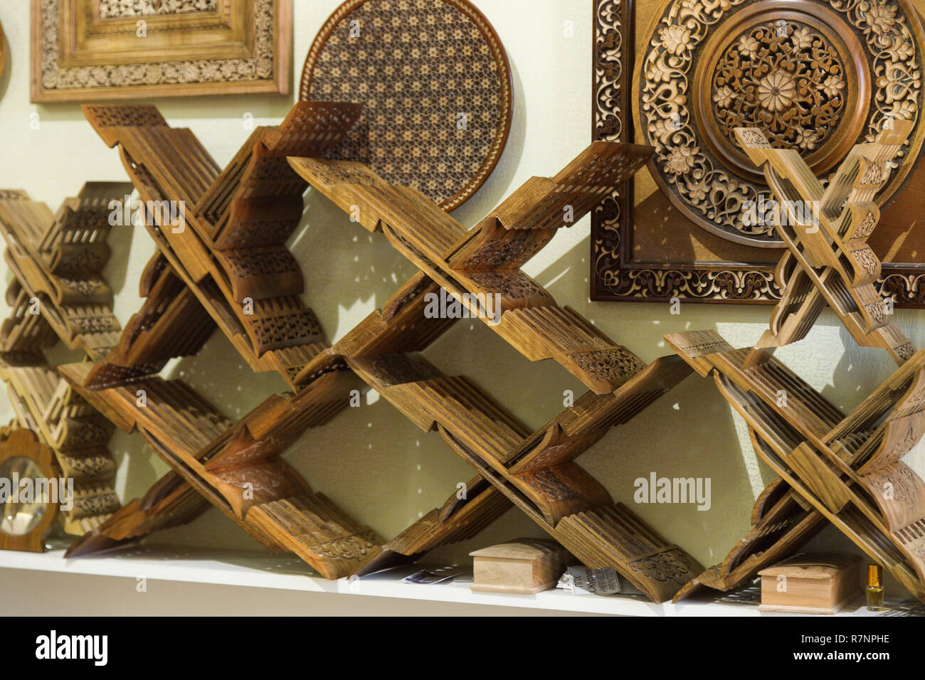 Store of ingenious rihals. Wooden book stands in Bukhara, Uzbekistan ...