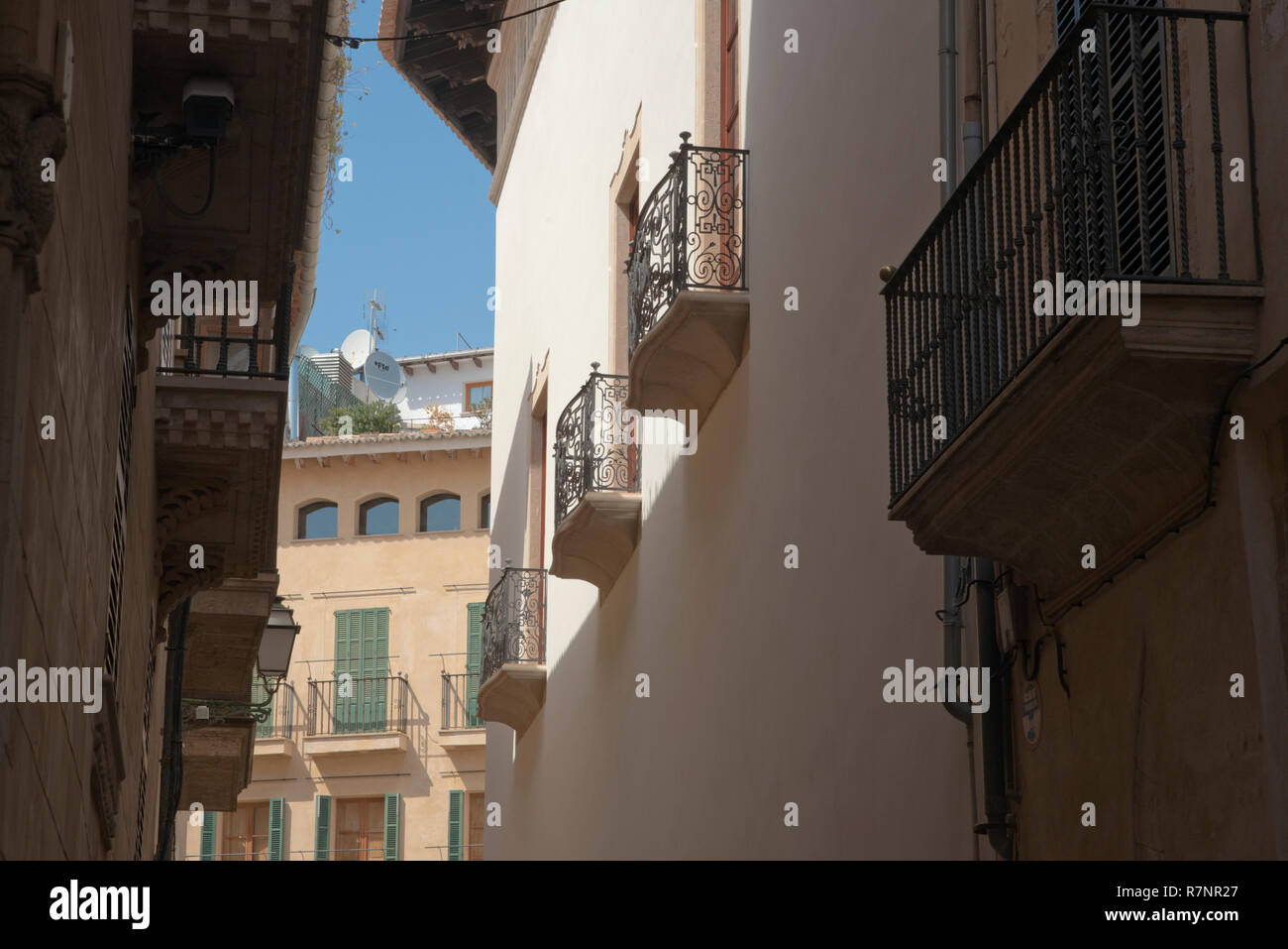 Balconies on upper stories of buildings in the Calle de la Portella ...