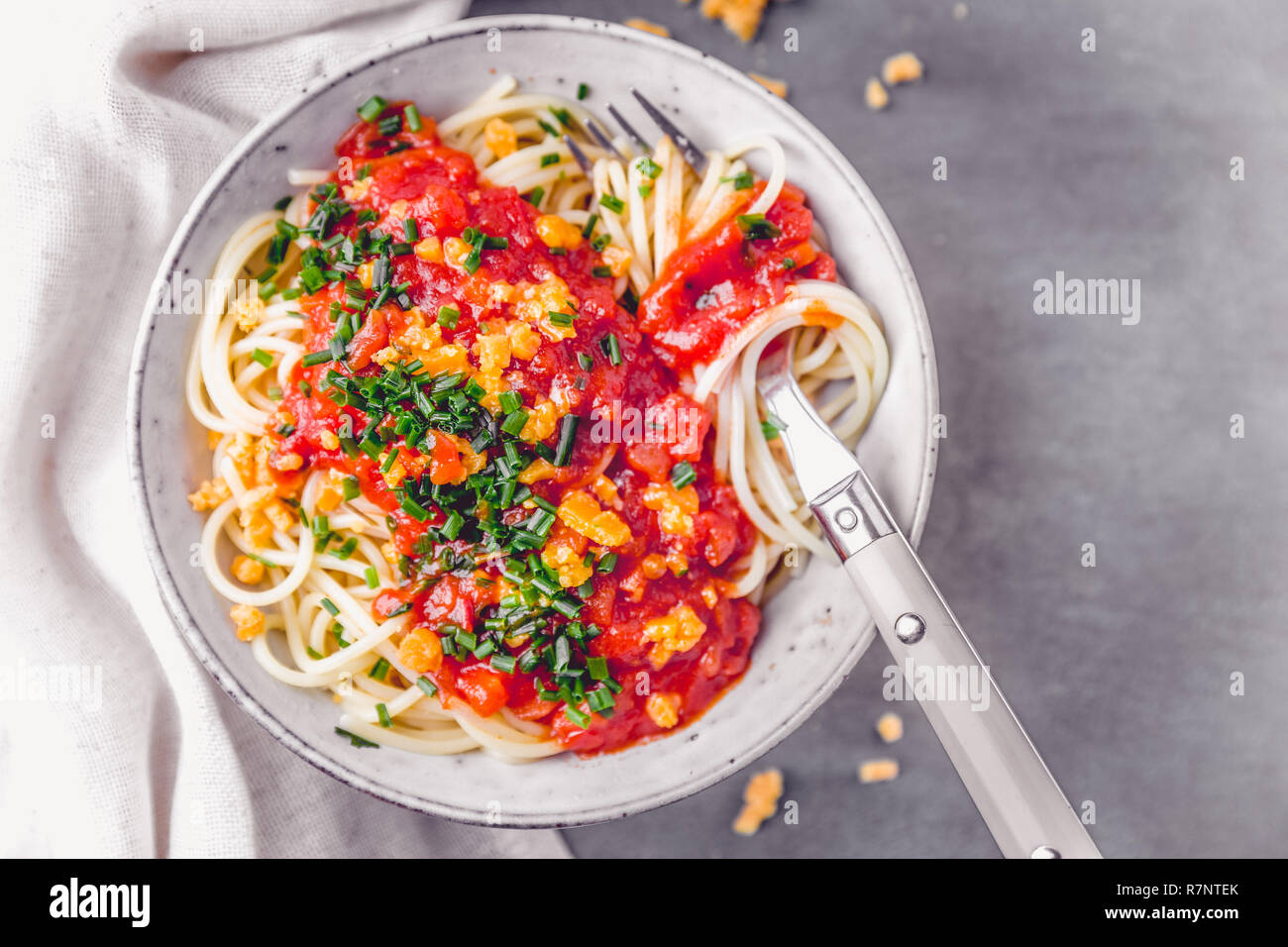 Italian Spaghetti in a bowl with cheddar cheese Stock Photo - Alamy