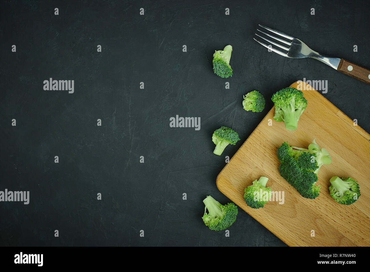placer green broccoli segments from a small bucket. Healthy eating ...