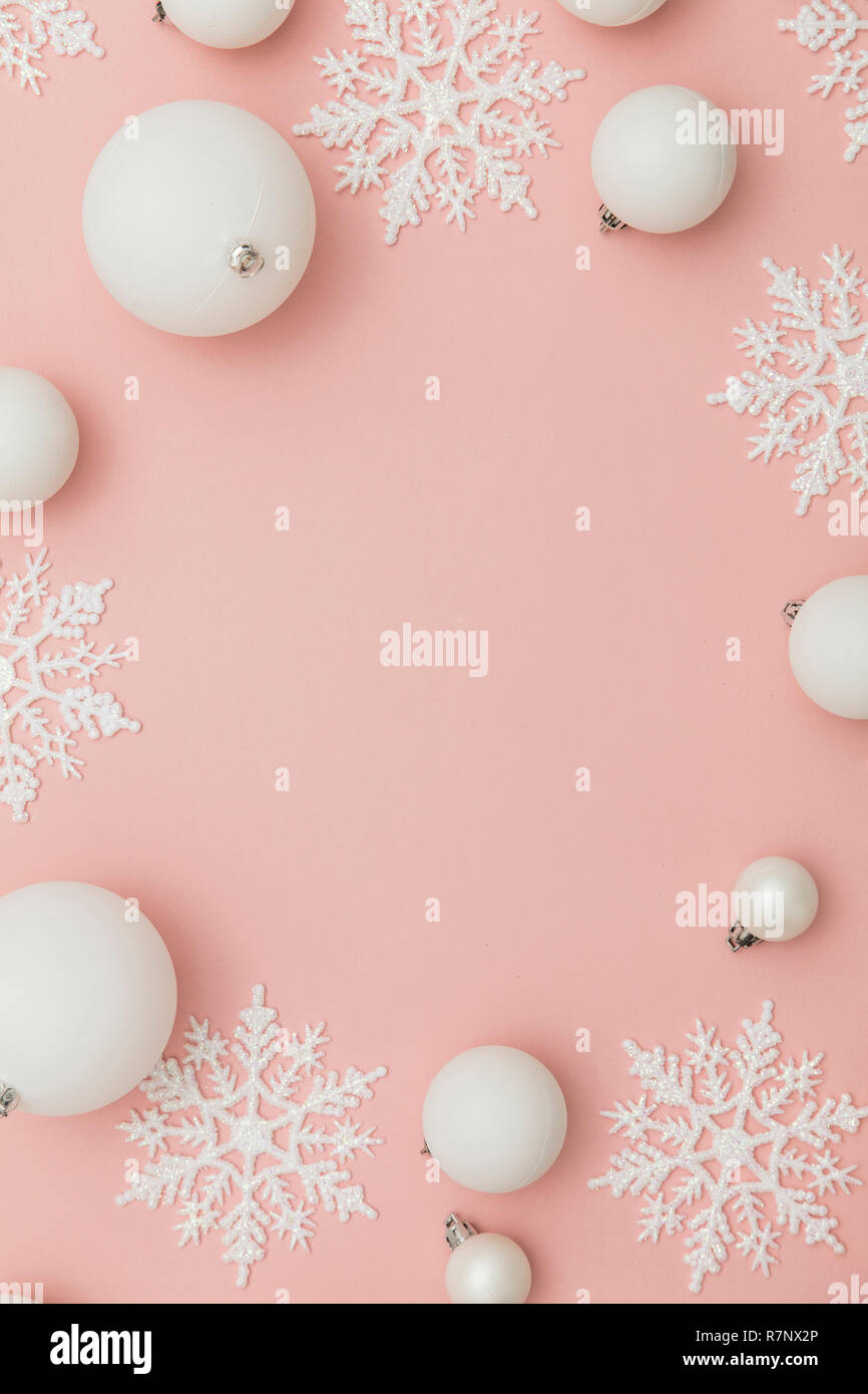 Festive winter composition. White christmas balls and snowflakes on a ...