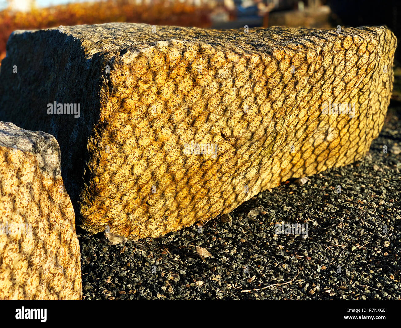 Shadow of a fence reflected on a Rock at Dusk Stock Photo - Alamy