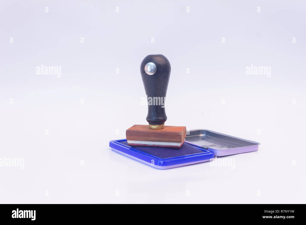 number stamp on blue ink on isolated white background office work tool ...