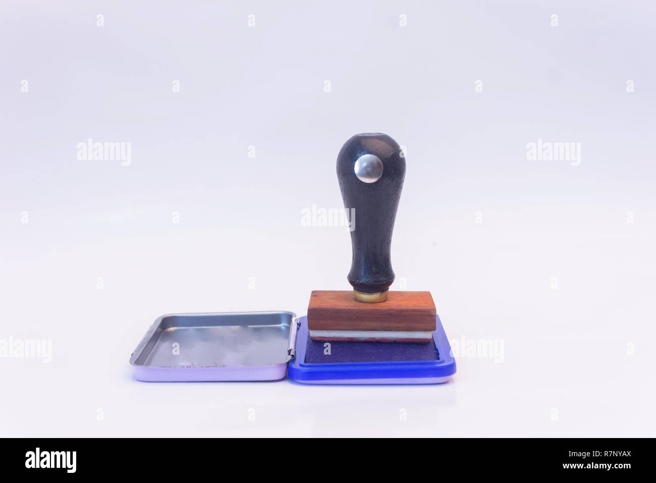 number stamp on blue ink on isolated white background office work tool ...