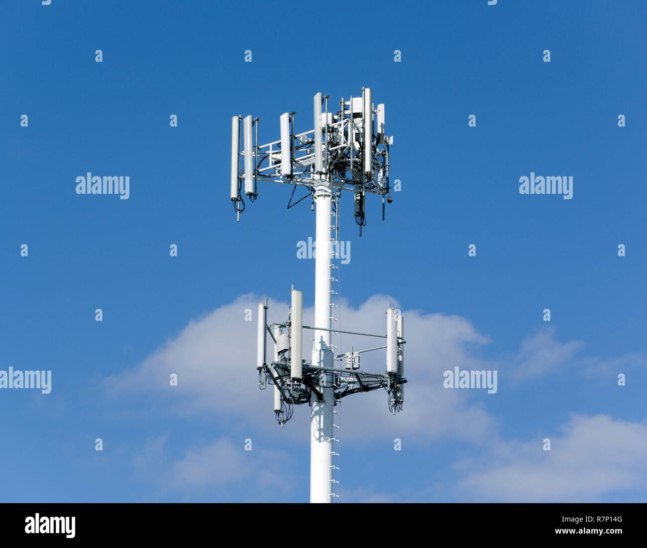 Cell phone antennas on tower Stock Photo - Alamy