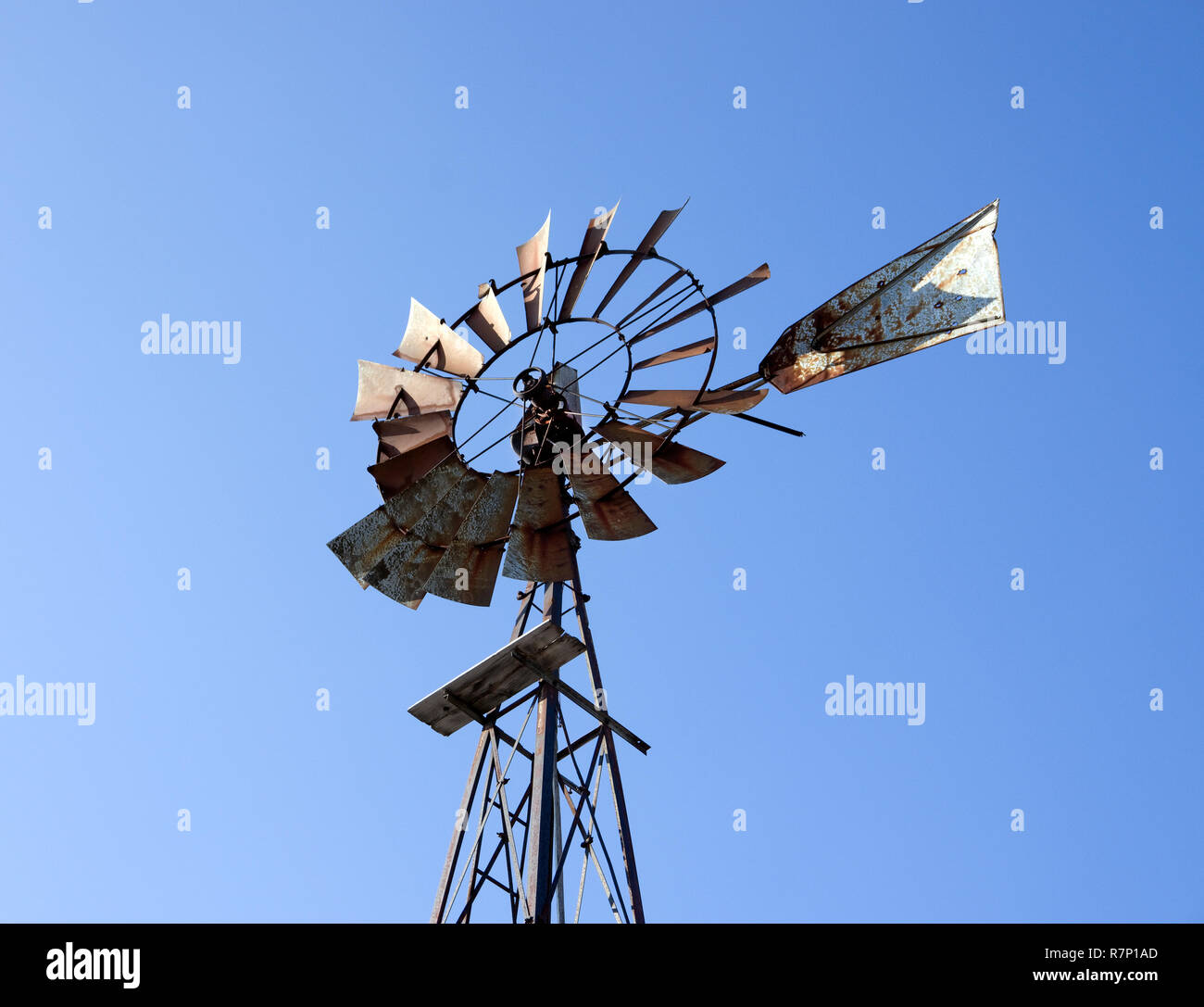 Abandoned rusting farm windmill Stock Photo - Alamy