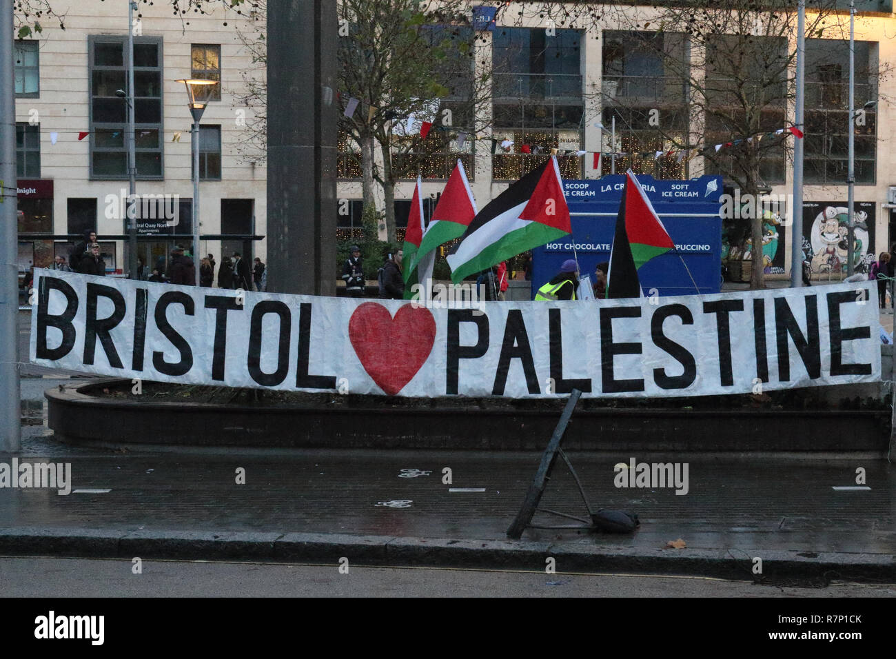 A banner and some Palestinian flags in a demonstration to support ...