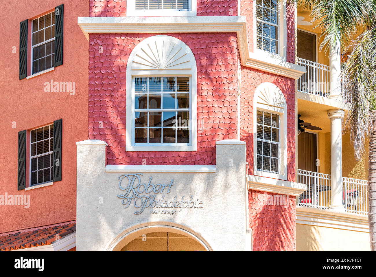 Naples, USA - April 30, 2018: Bayfront pink, red, orange colorful ...
