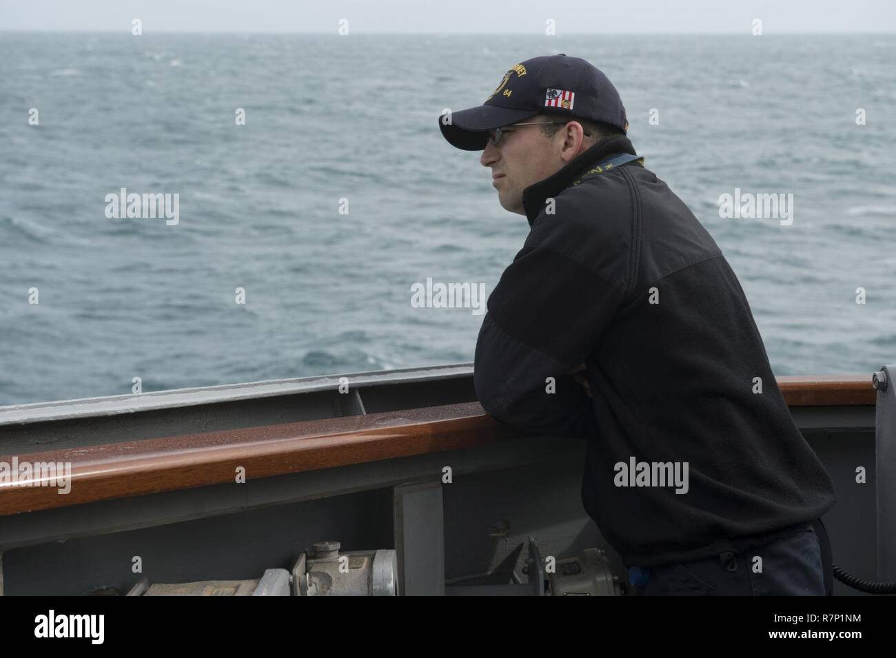 ATLANTIC OCEAN - (March 21, 2017) - Ensign Thibaut Delloue stands on ...