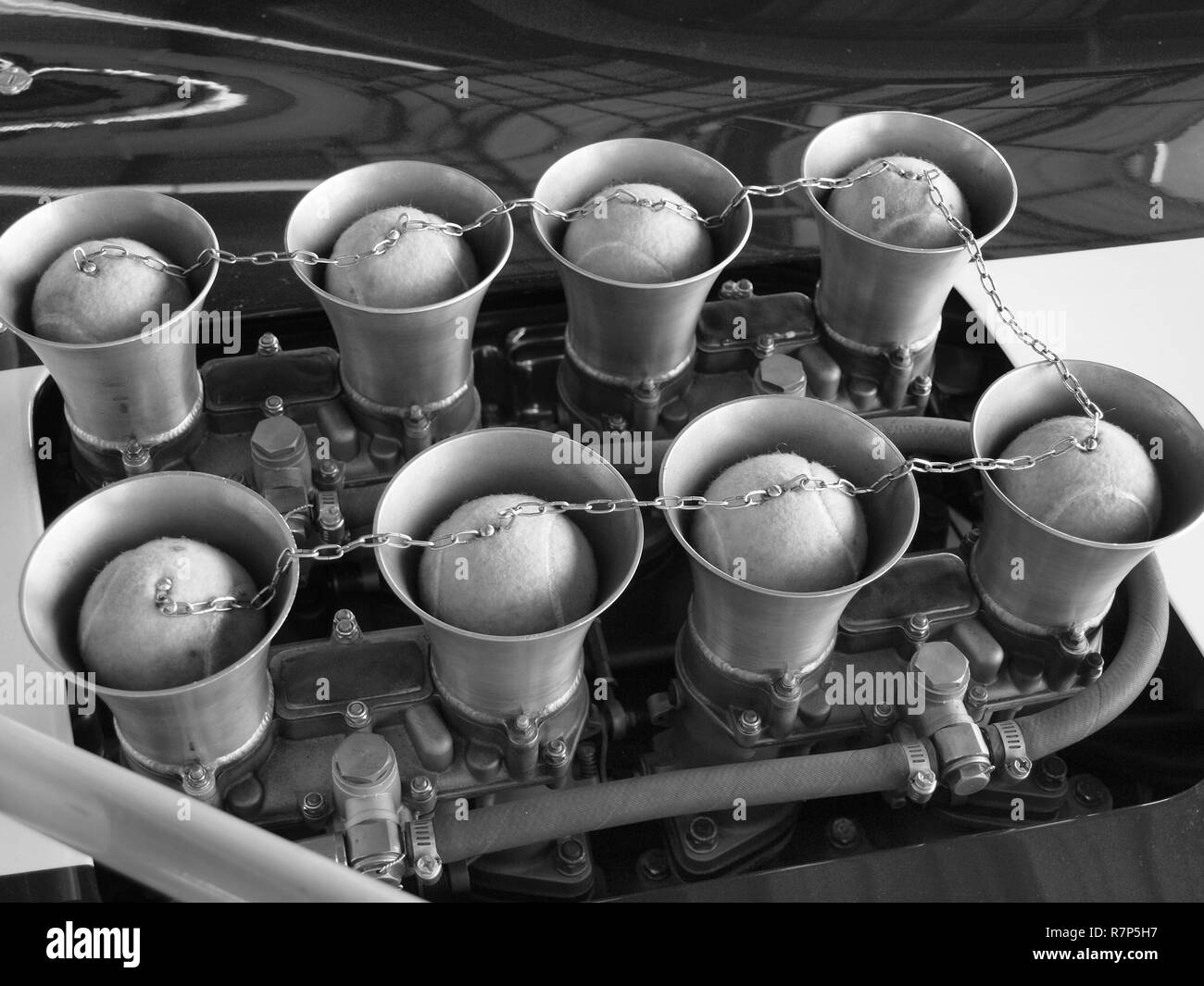 Four Weber carbs on a 1970's era Can-Am race car in the garage area of ...