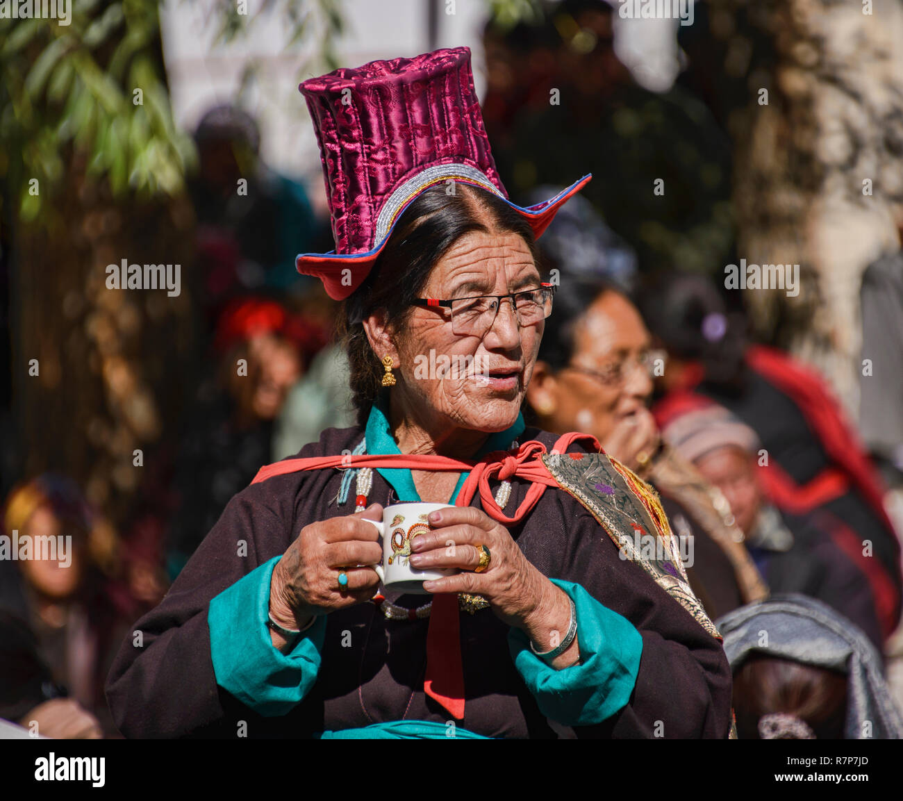 Ladakhi woman in traditional dress at a Tara prayer gathering, Leh ...