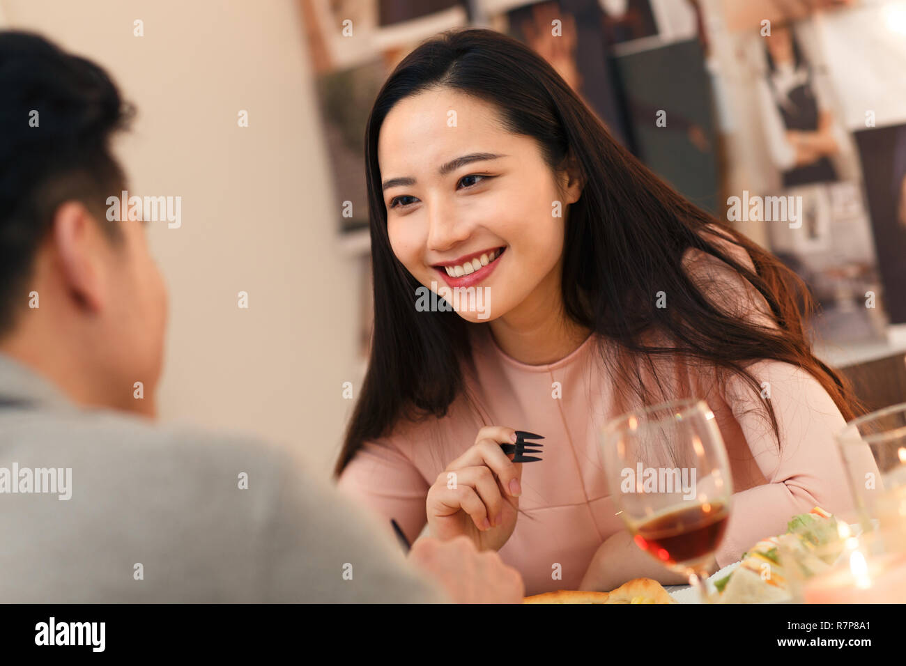 Young couples eating dinner Stock Photo - Alamy