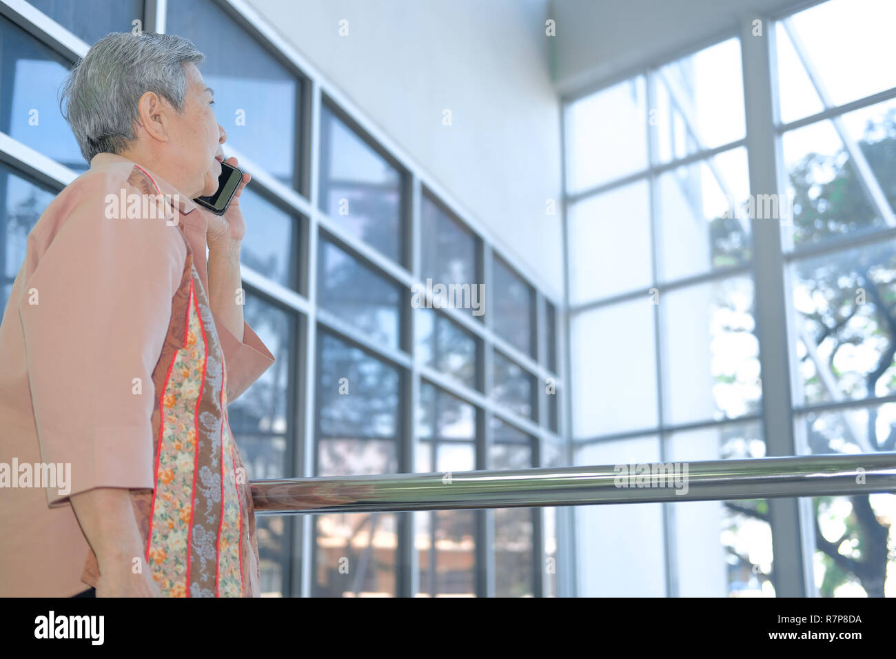 old elder woman talk on mobile phone. elderly senior speaking on ...