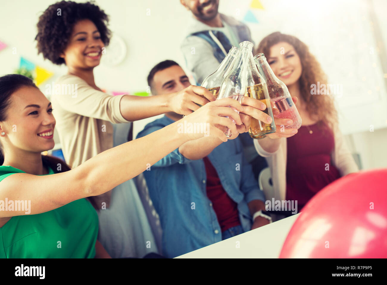 happy team with drinks celebrating at office party Stock Photo - Alamy