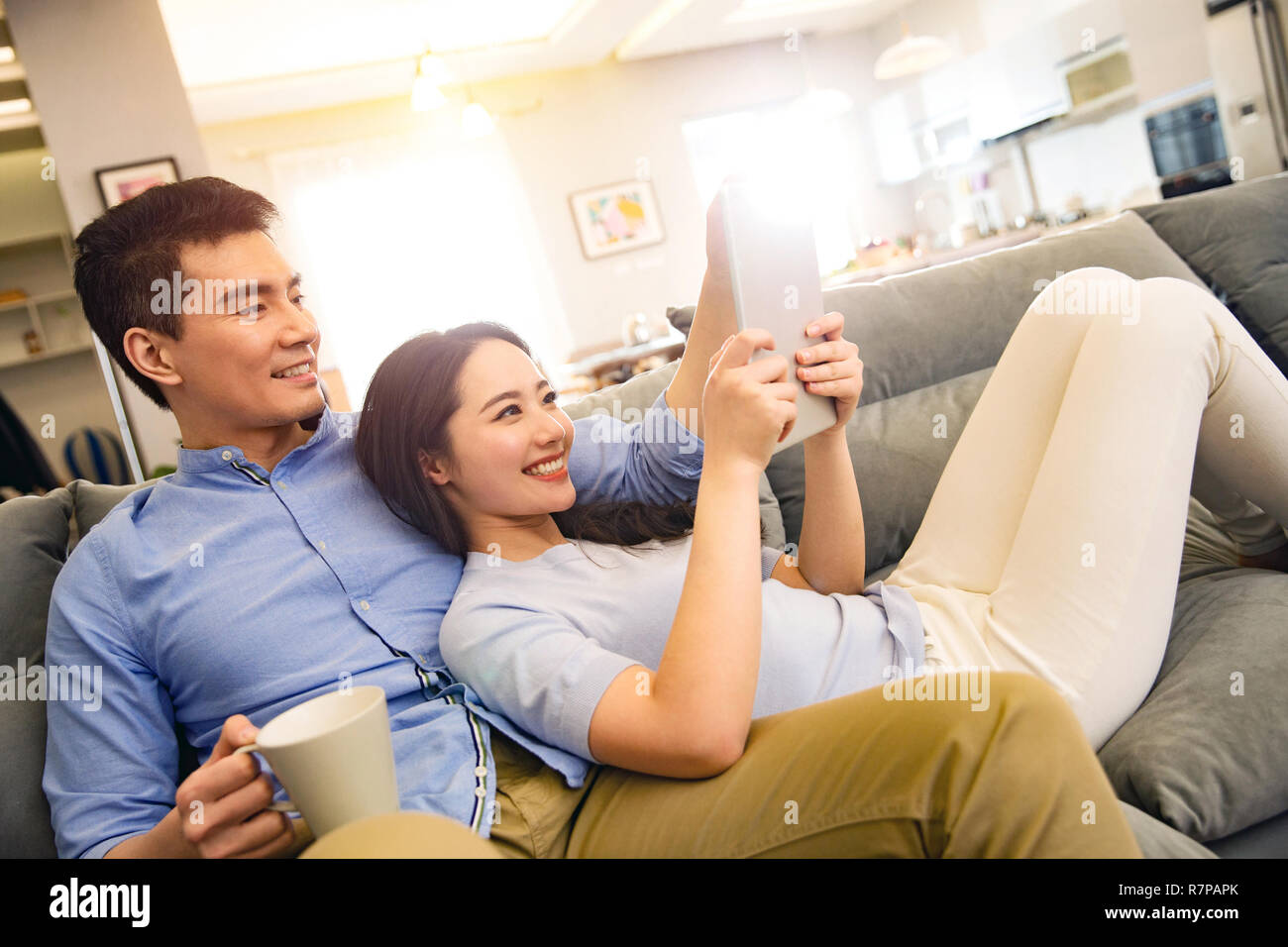 Romantic couples in the living room Stock Photo - Alamy